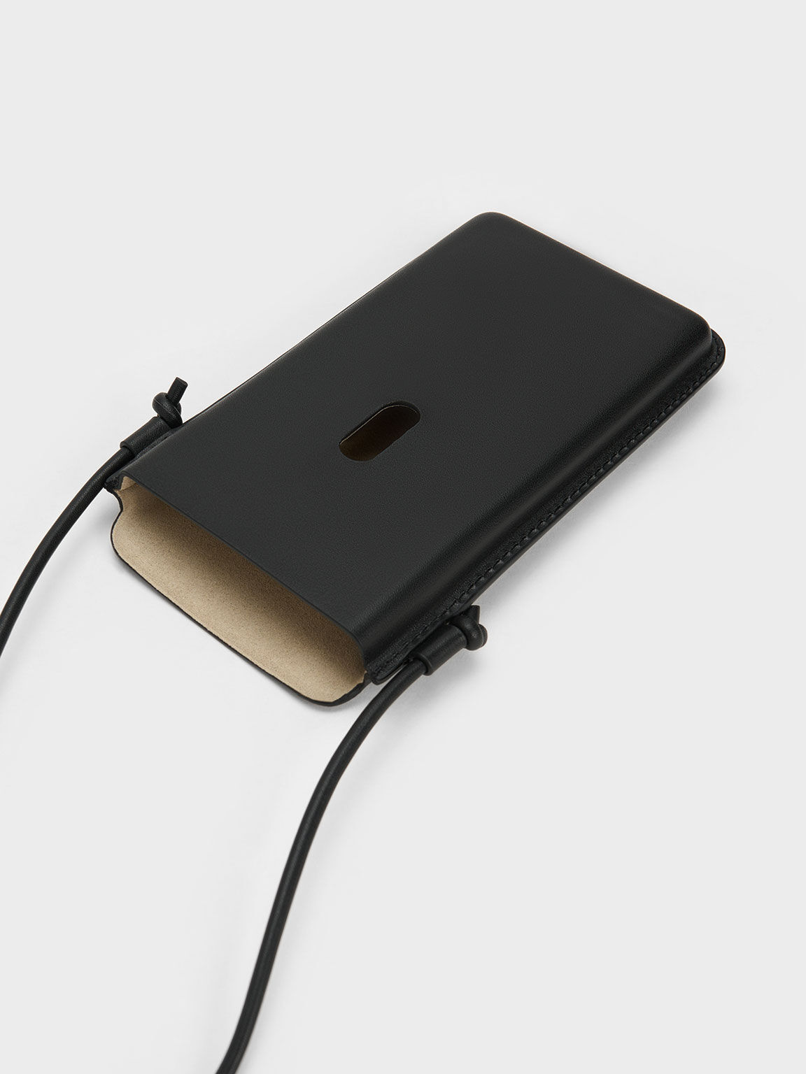 Black Camelia Phone Pouch - CHARLES & KEITH MX