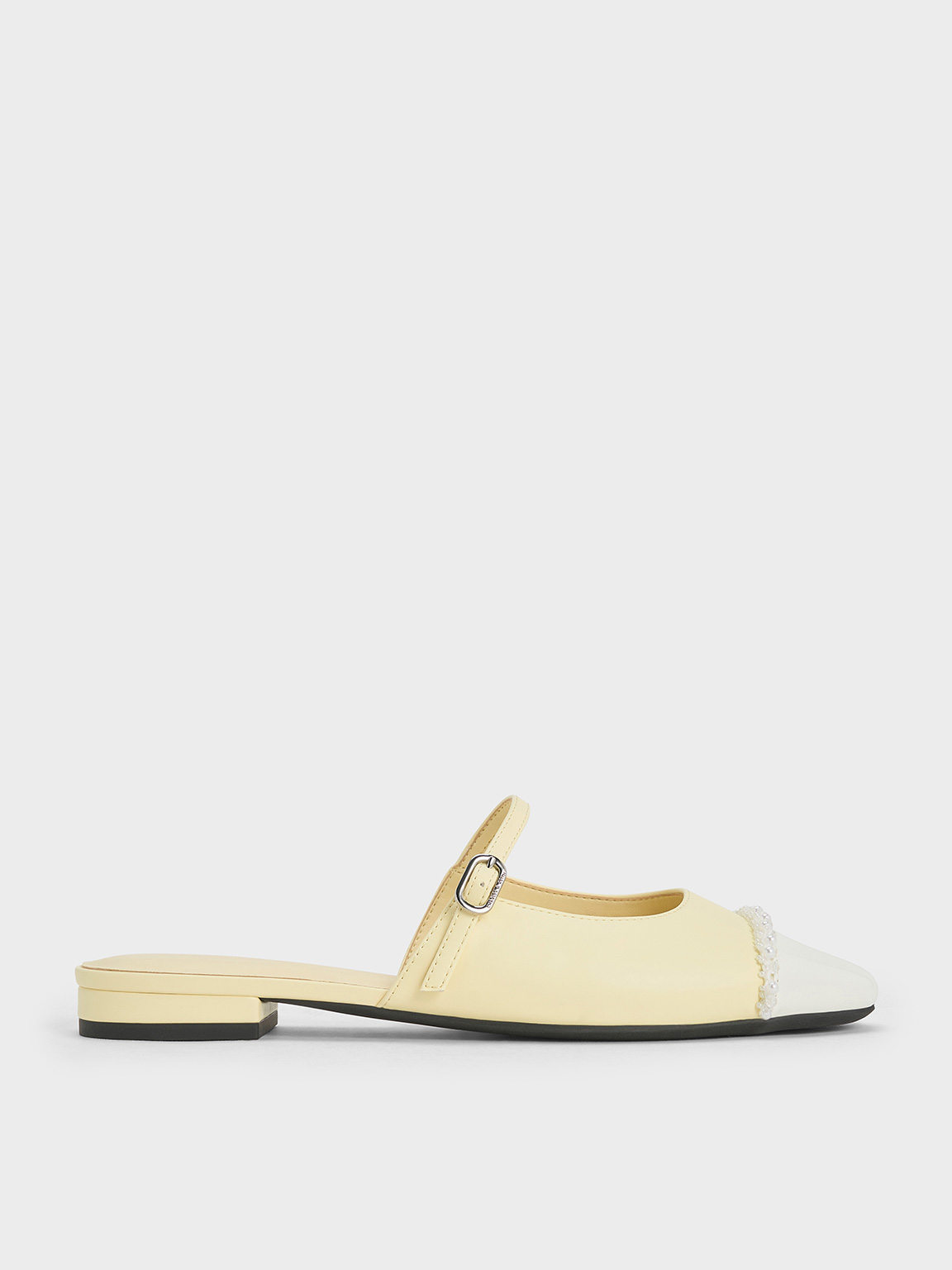 Butter Pearl-Embellished Cap-Toe Flat Mules - CHARLES & KEITH KR